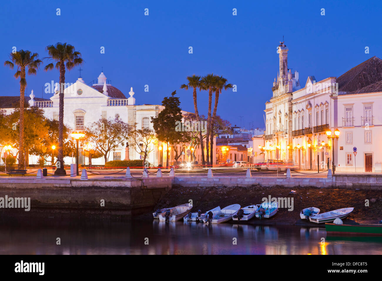 Portugal, Faro, Boats in harbour, old town in background Stock Photo ...