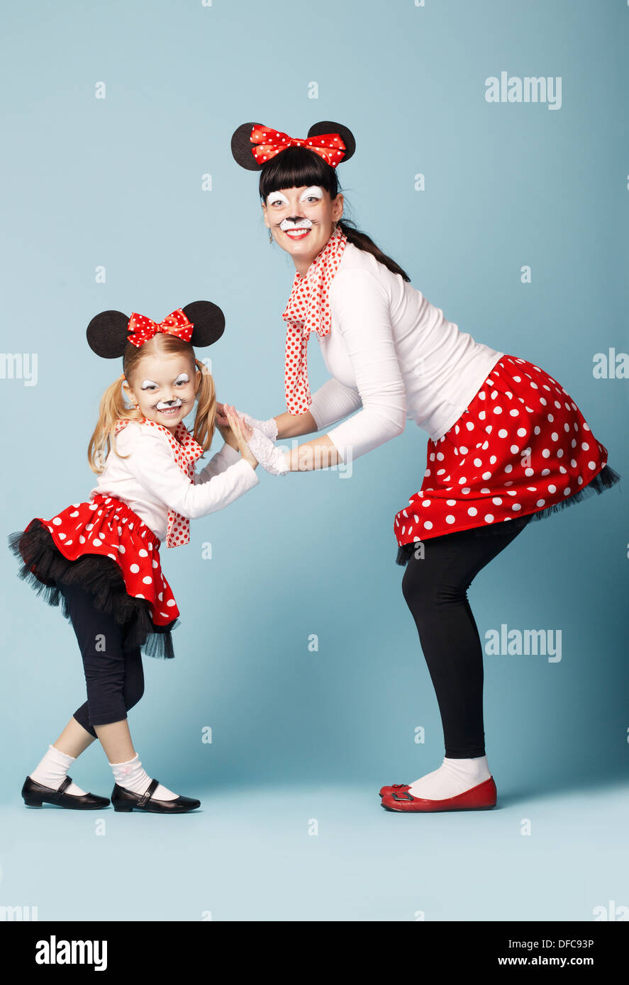 two beautiful girls with mouse masks Stock Photo - Alamy