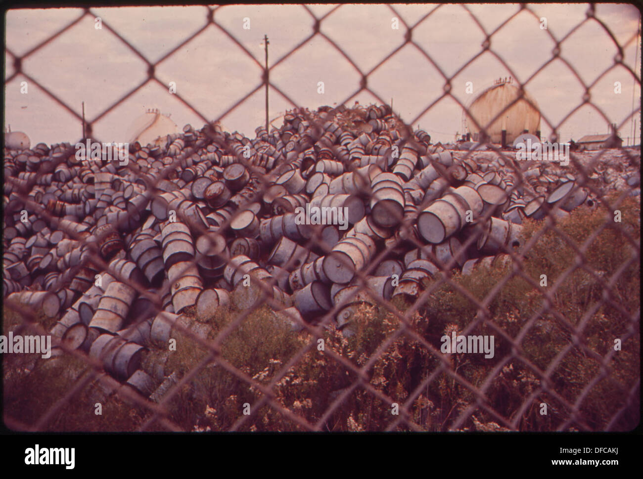 Damaged oil drums hi-res stock photography and images - Alamy