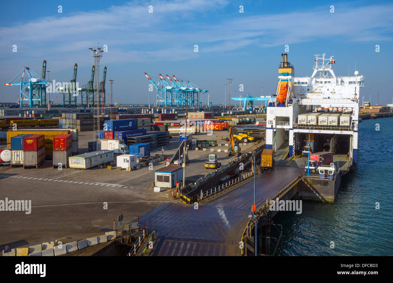 Zeebrugge port and container terminal, commerce, with ships, cranes and ...
