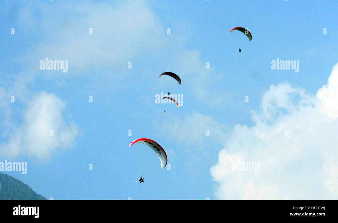Srinagar, Indian Administered Kashmir 02 october 2013. .Paragliders ...