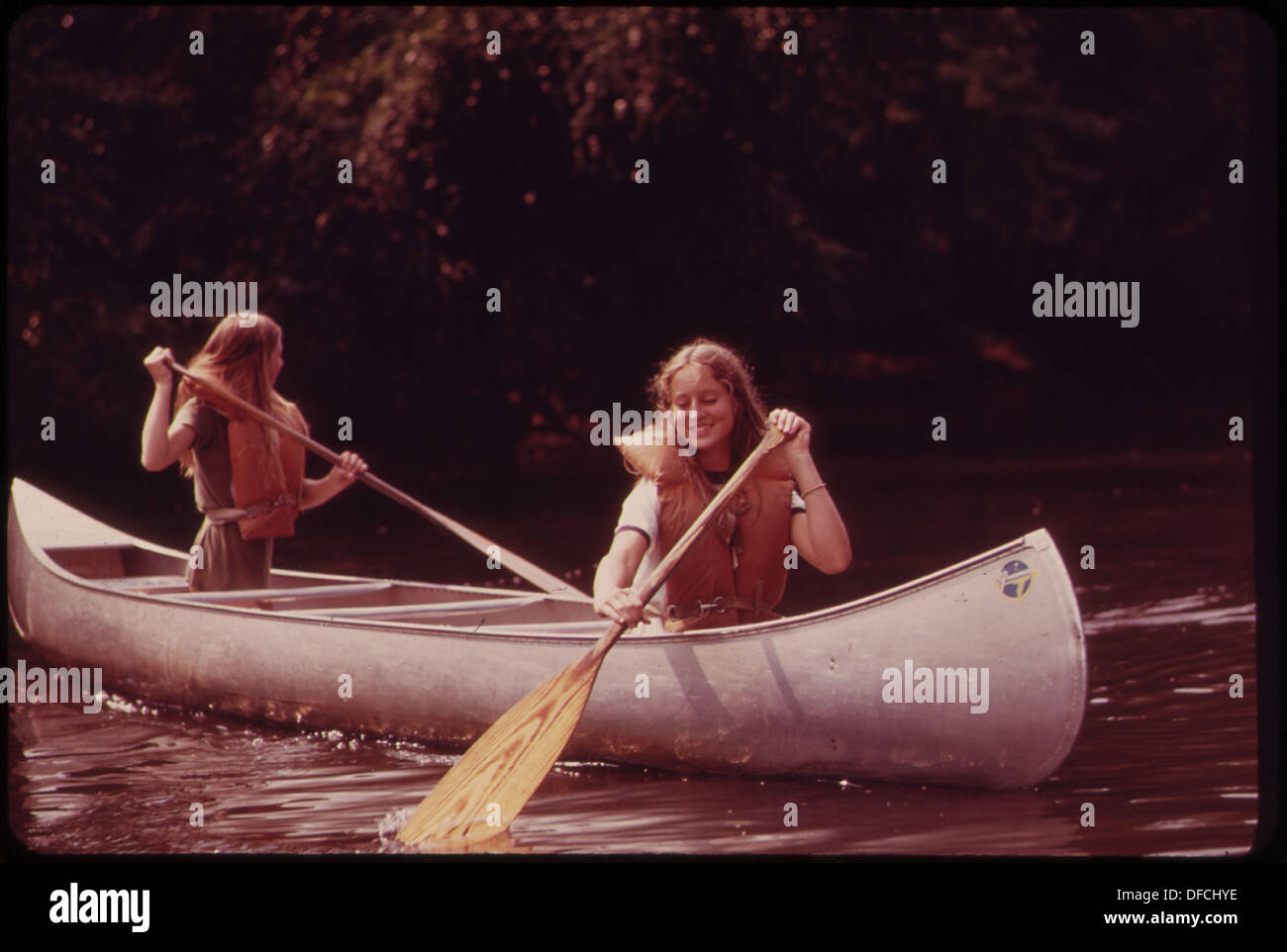 This image shows canoers on the Wisconsin River at Wisconsin Dells, a ...