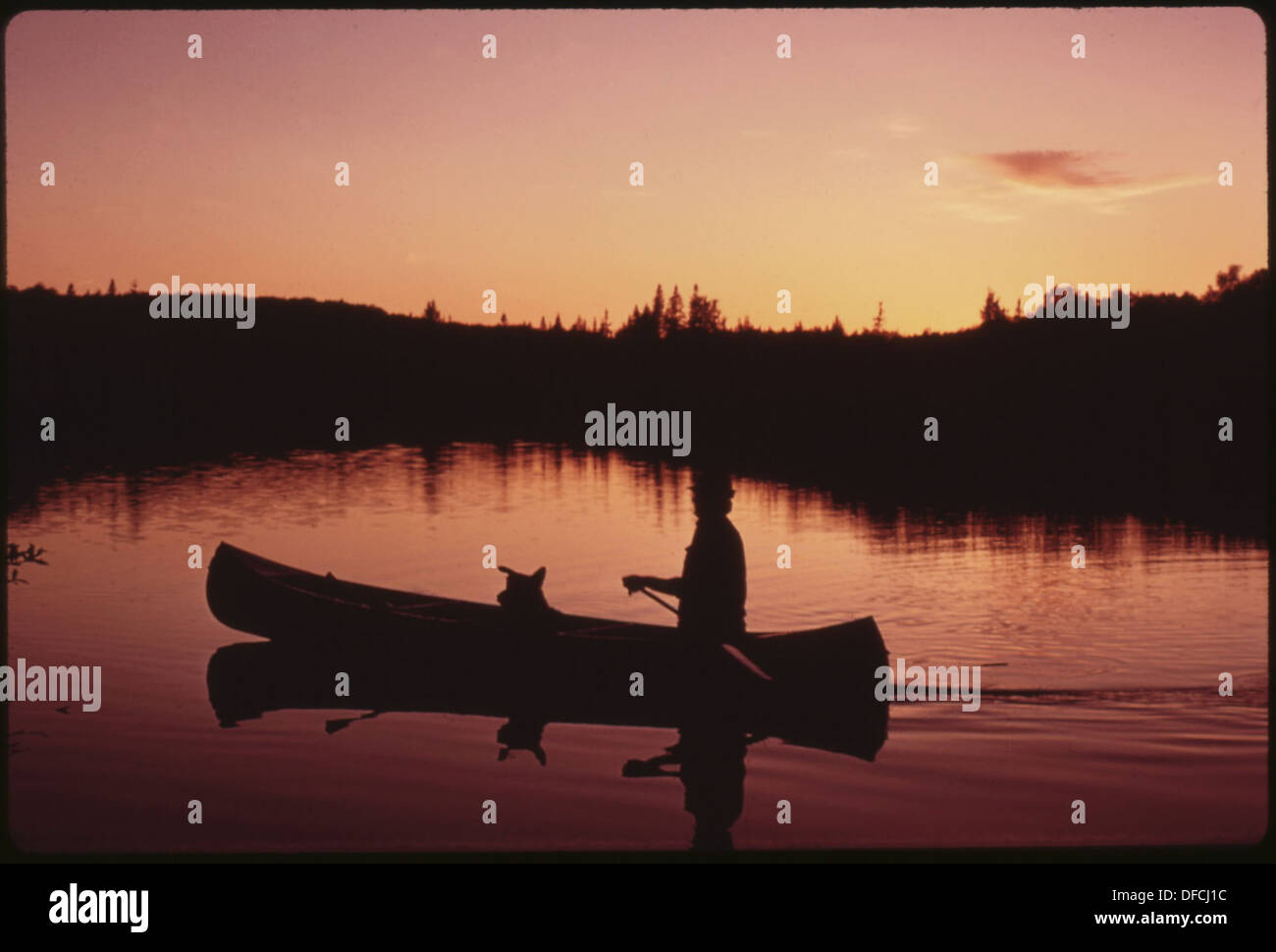 CANOE ON THE NORTH BRANCH OF MOOSE RIVER AT SUNSET, BELOW RONDAXE LAKE ...