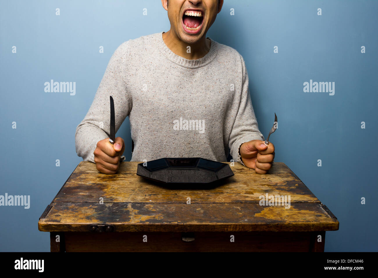 Starving man hi-res stock photography and images - Alamy