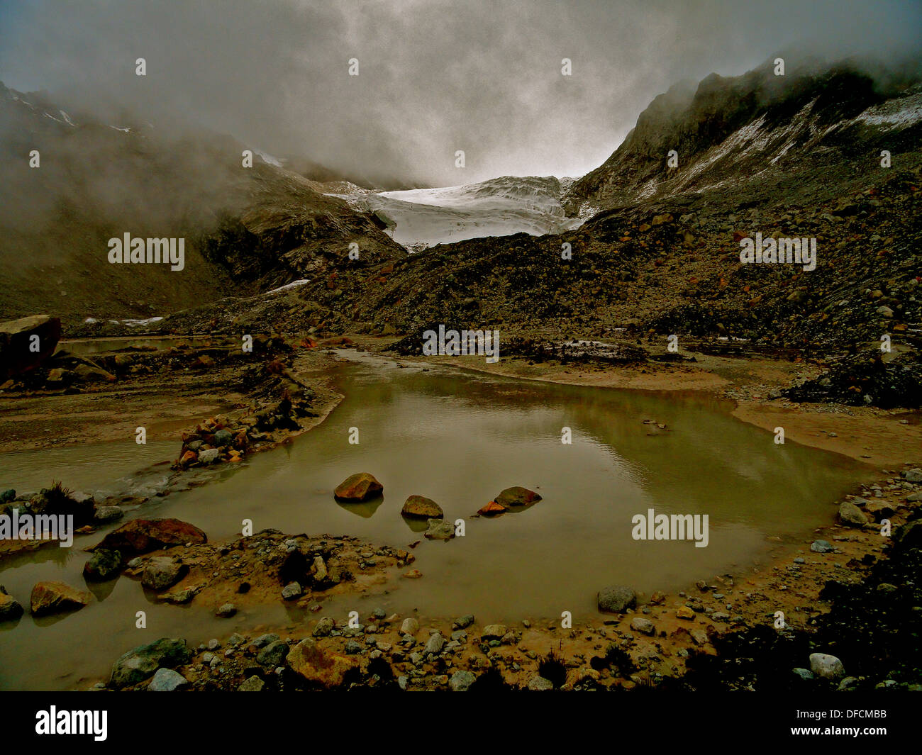 The snow topped mountain of Huayna Potosi in the Cordillera Real near ...