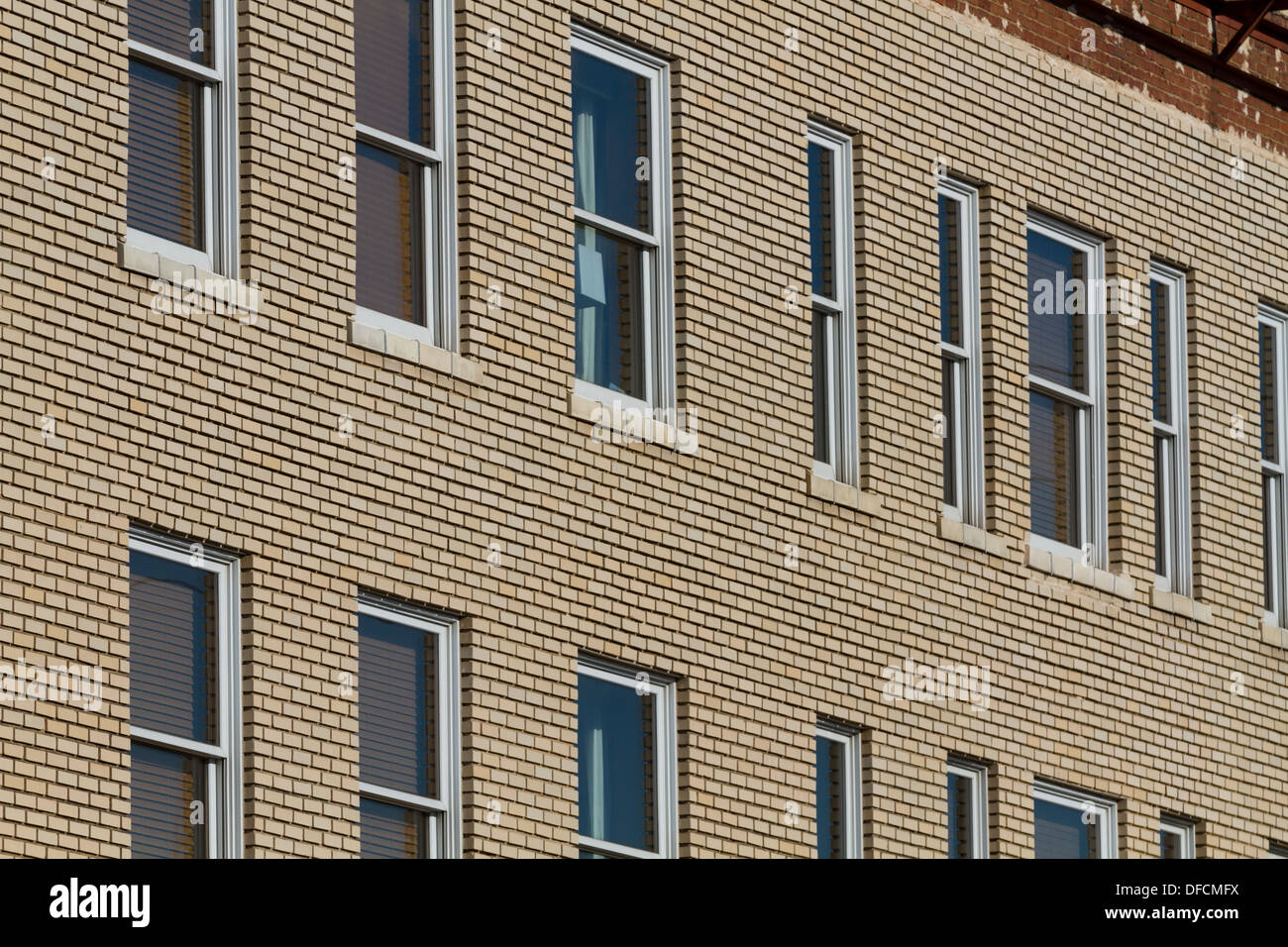 Windows in a brick wall Stock Photo - Alamy