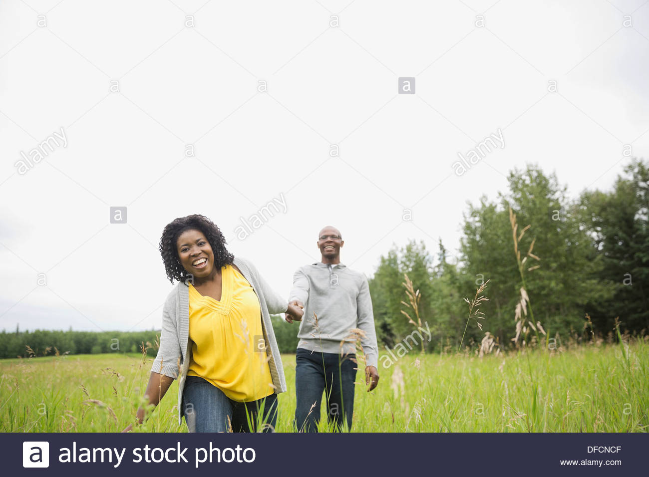 Walking through field hi-res stock photography and images - Alamy