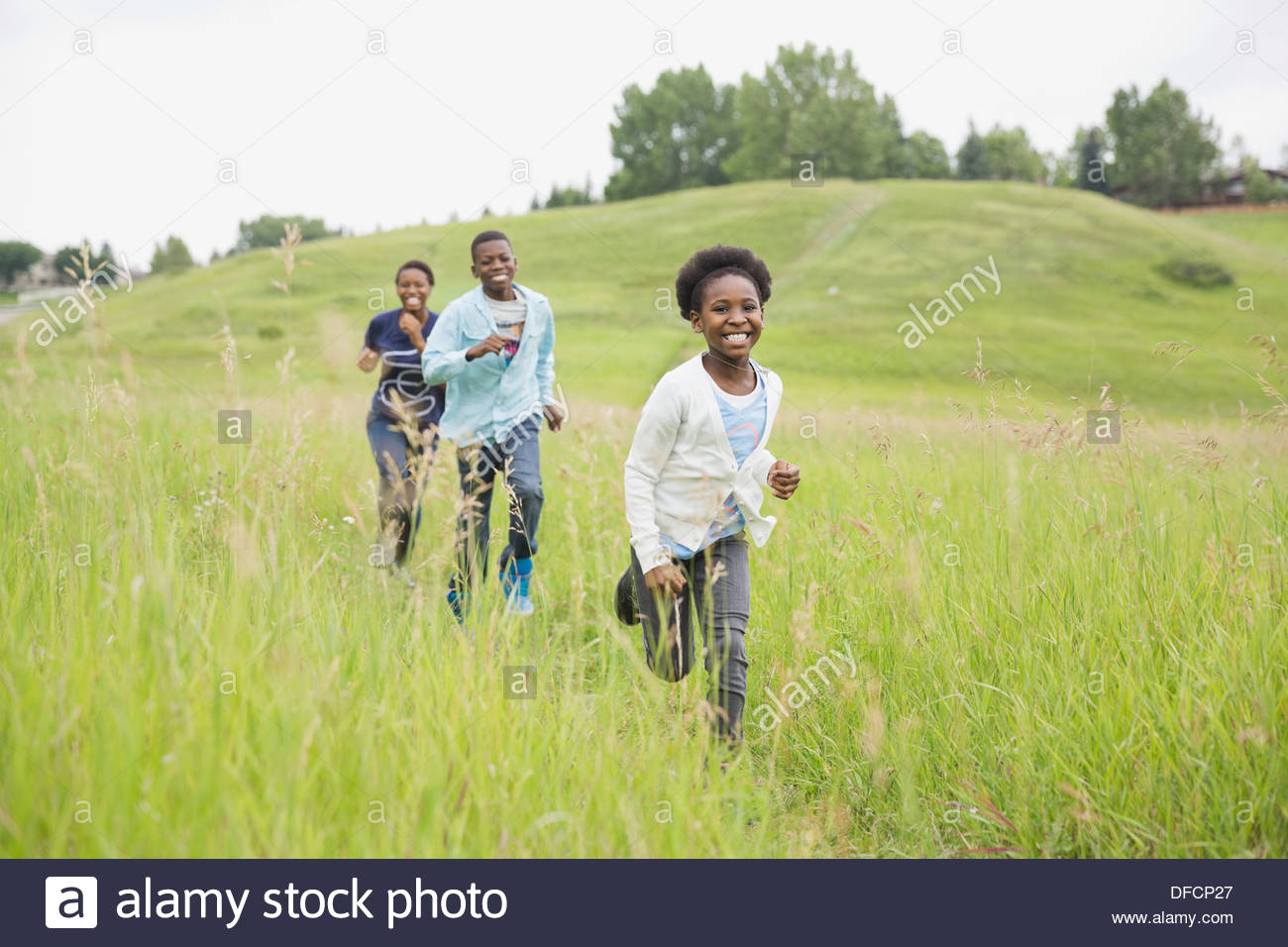 Child running through the field hi-res stock photography and images - Alamy