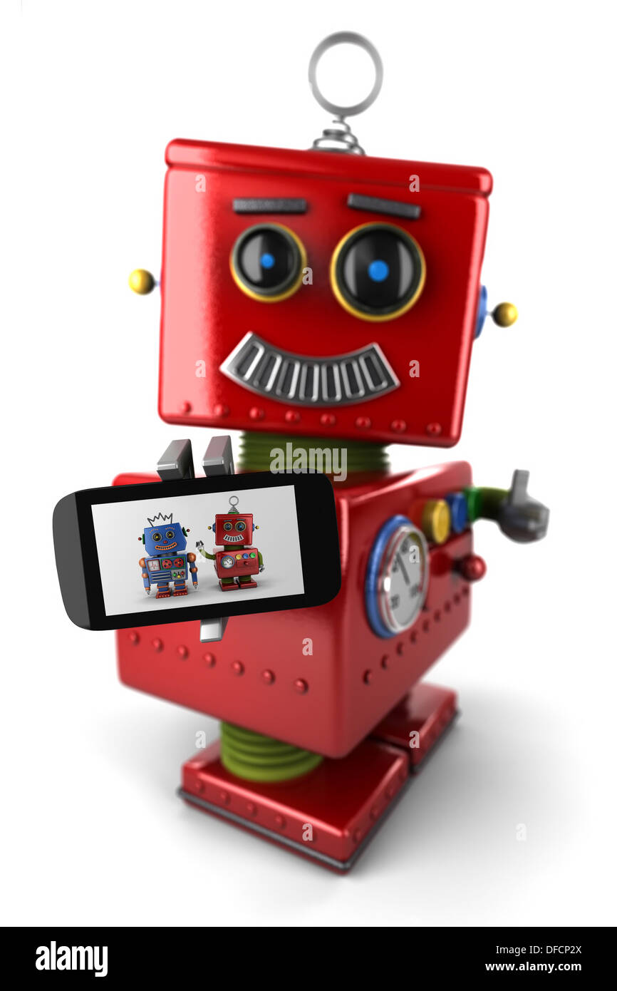 Happy vintage toy robot with smartphone Stock Photo - Alamy