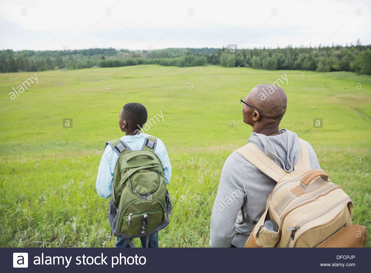 Father standing and looking up hi-res stock photography and images - Alamy