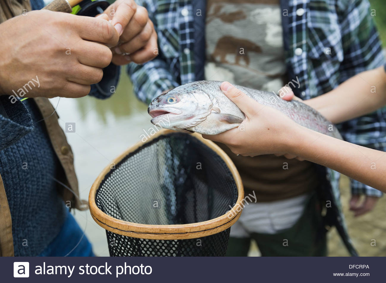 Gathered around hi-res stock photography and images - Alamy