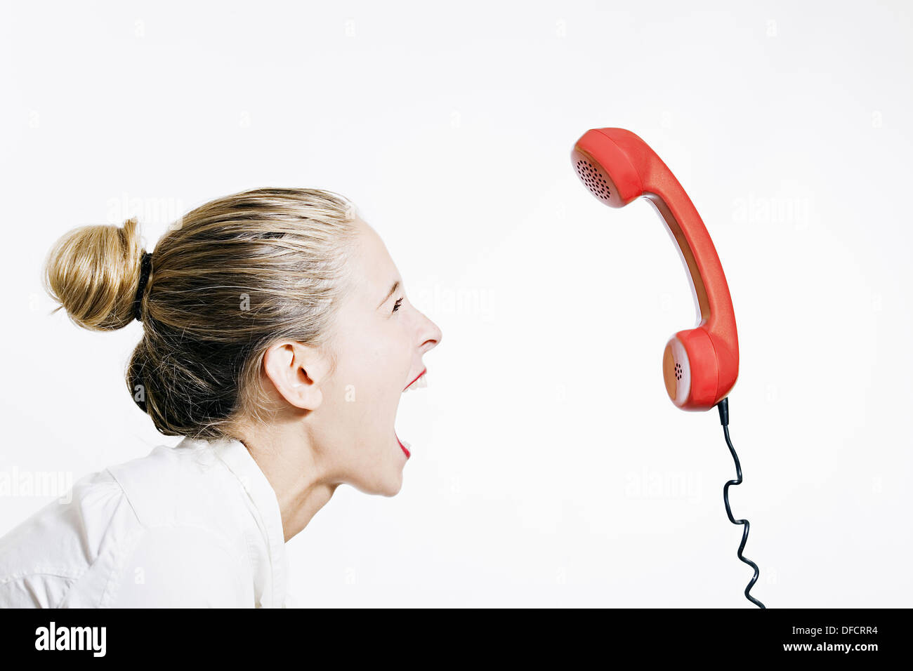 Woman screaming,desperate because of the stress Stock Photo - Alamy