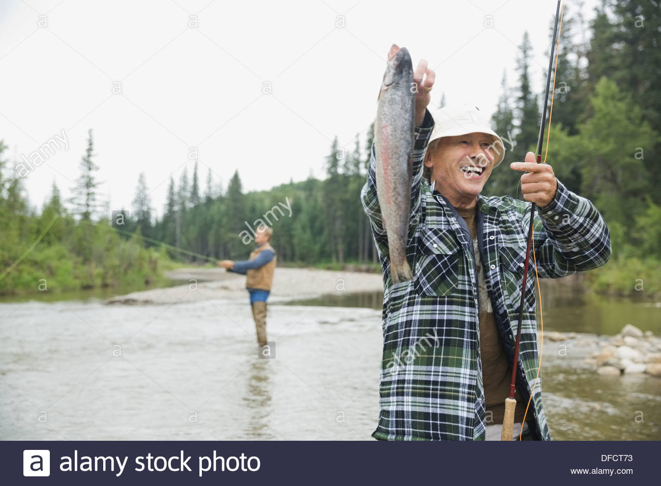Fish catching man hi-res stock photography and images - Alamy