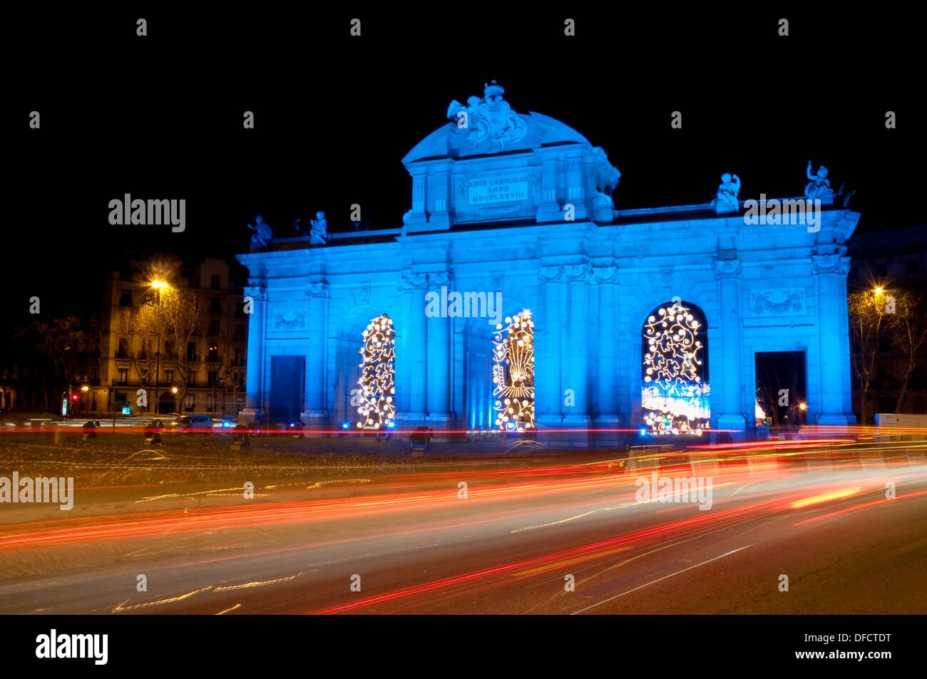 Puerta de Alcalá illuminated in blue, commemorating the Spanish ...
