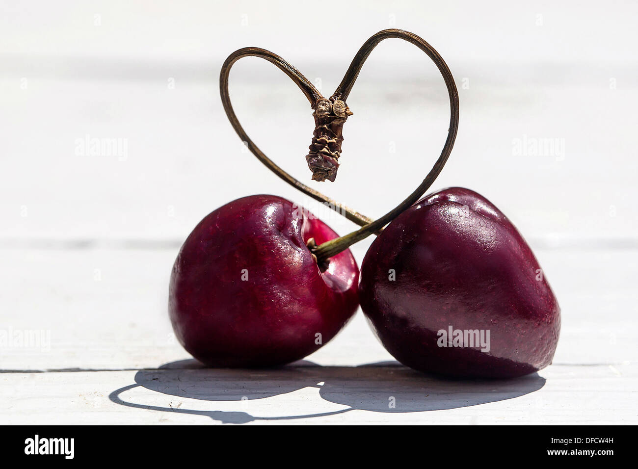 Germany, Bavaria, Heart shaped formed with stems of cherry Stock Photo ...