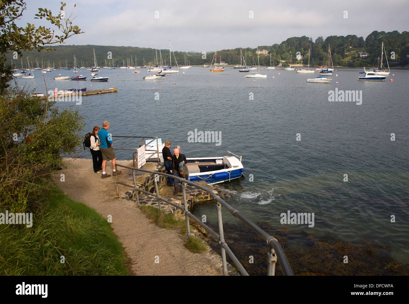 Small passenger ferry crossing river Helford, Cornwall, England Stock ...