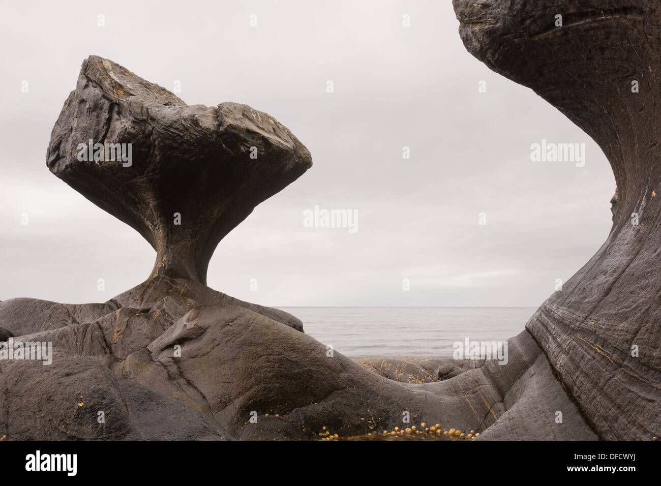 Beautiful rock formation called "Kannesteinen" at Vågsøy, west coast of ...