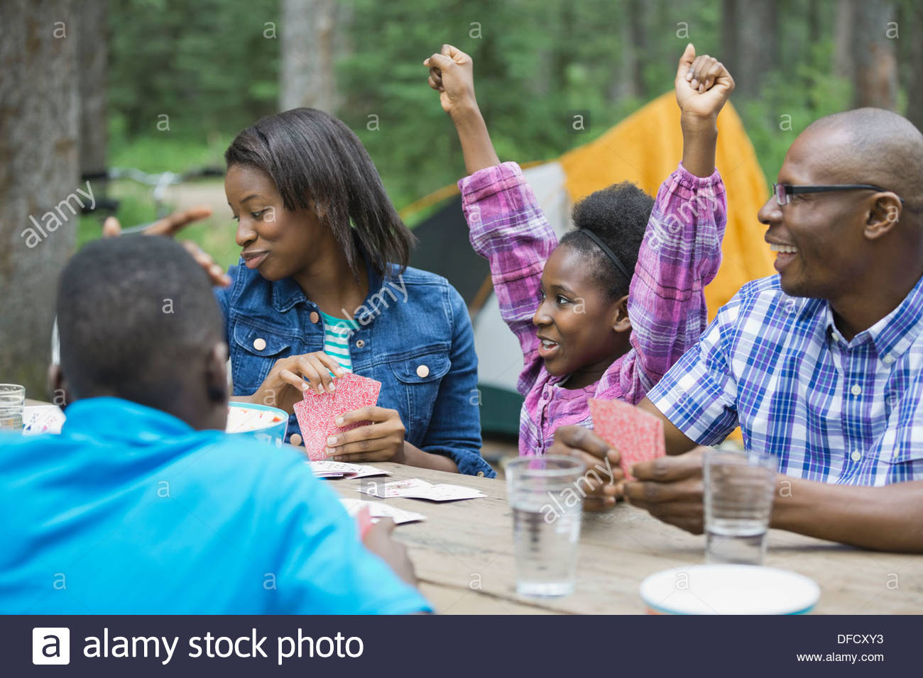 Girl 12 14 holding playing card hi-res stock photography and images - Alamy