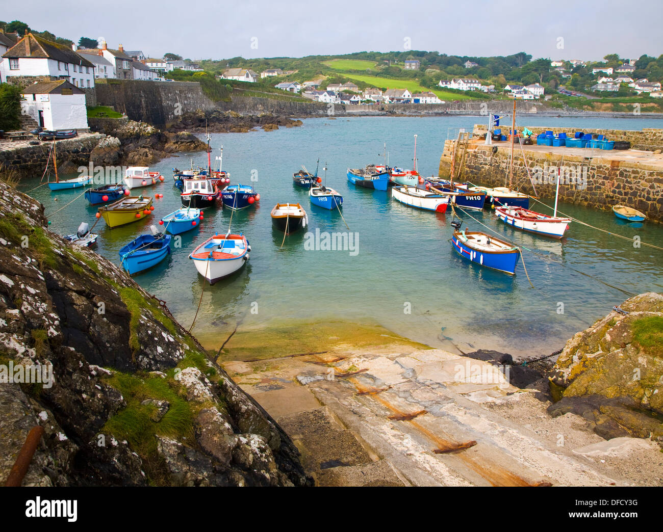Fishing boats in the harbour at the village of Coverack, Cornwall ...