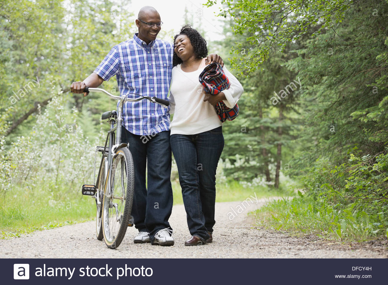 Bicycle people walking hi-res stock photography and images - Alamy