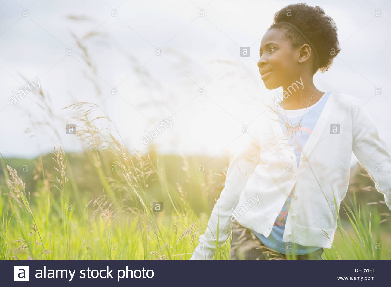 Child standing in field hi-res stock photography and images - Alamy