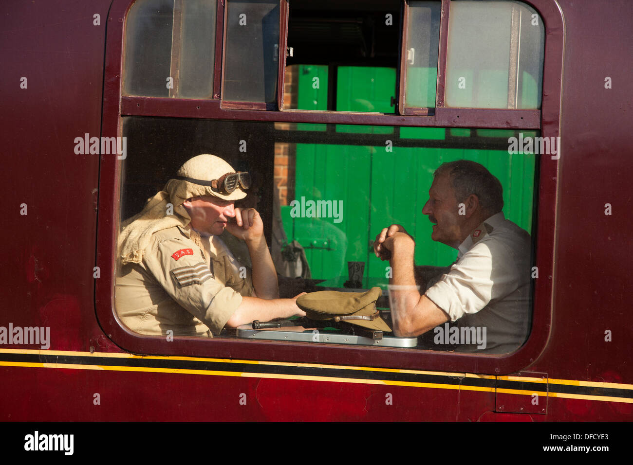 Two people in a train carriage Sheringham 1940's weekend festival Stock ...
