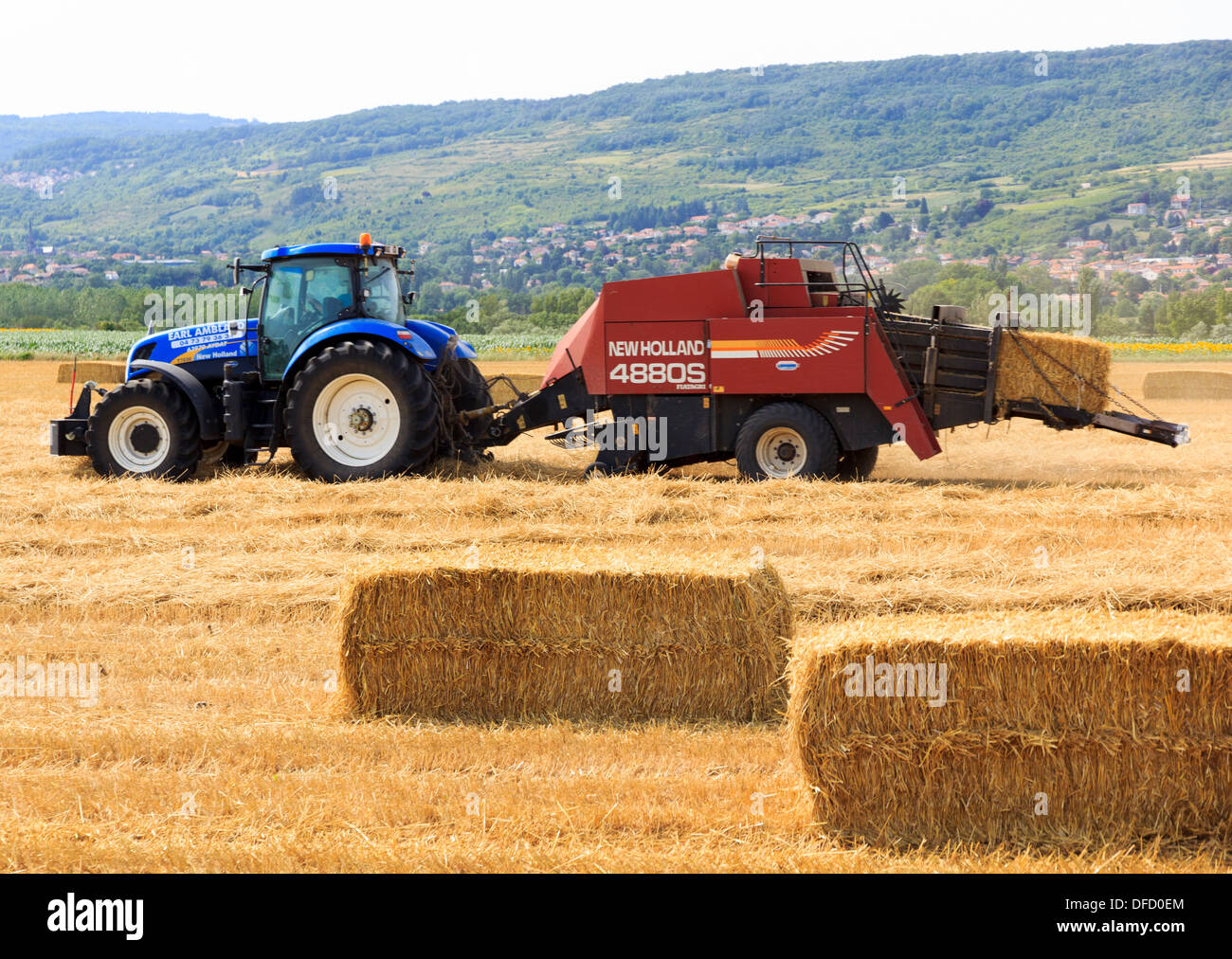 2 Aug 2013, near Issoire, Auvergne, France: hay being baled on a French ...