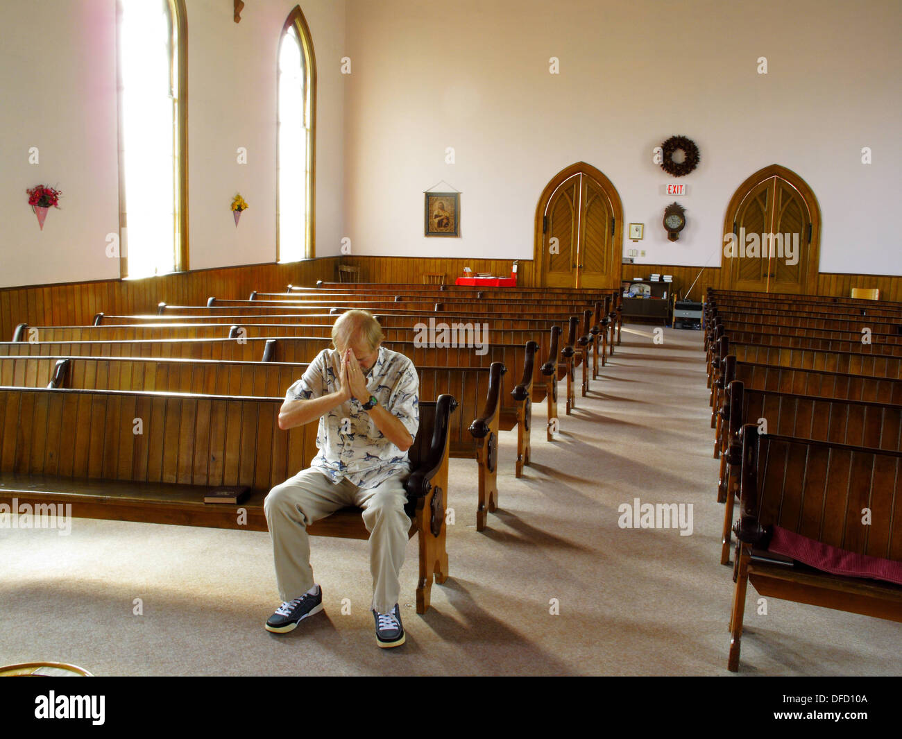 Man Alone In Church Praying Stock Photos & Man Alone In Church Praying ...