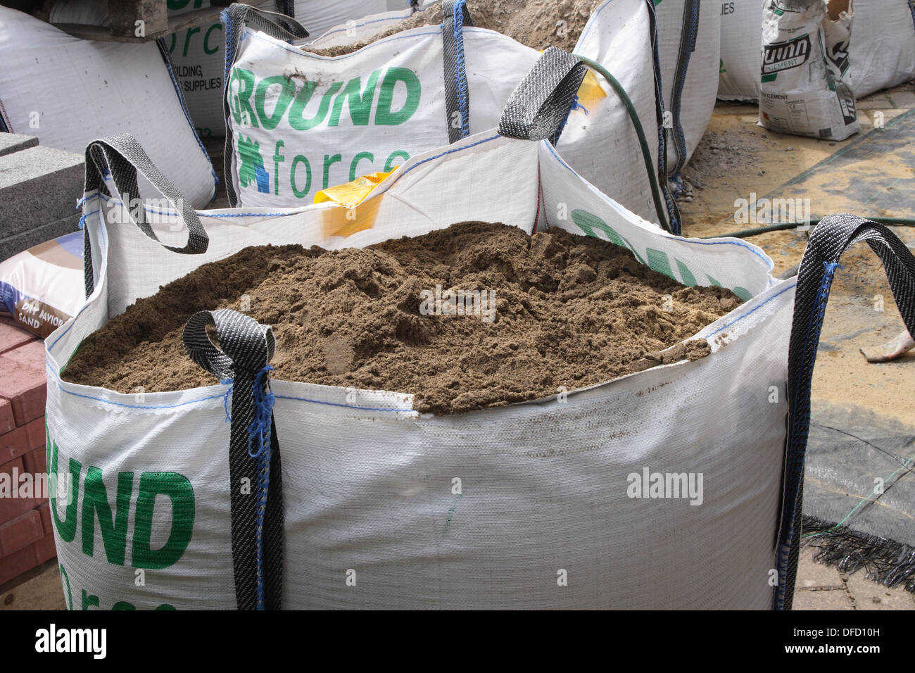 A large sack of builder's sand Stock Photo - Alamy