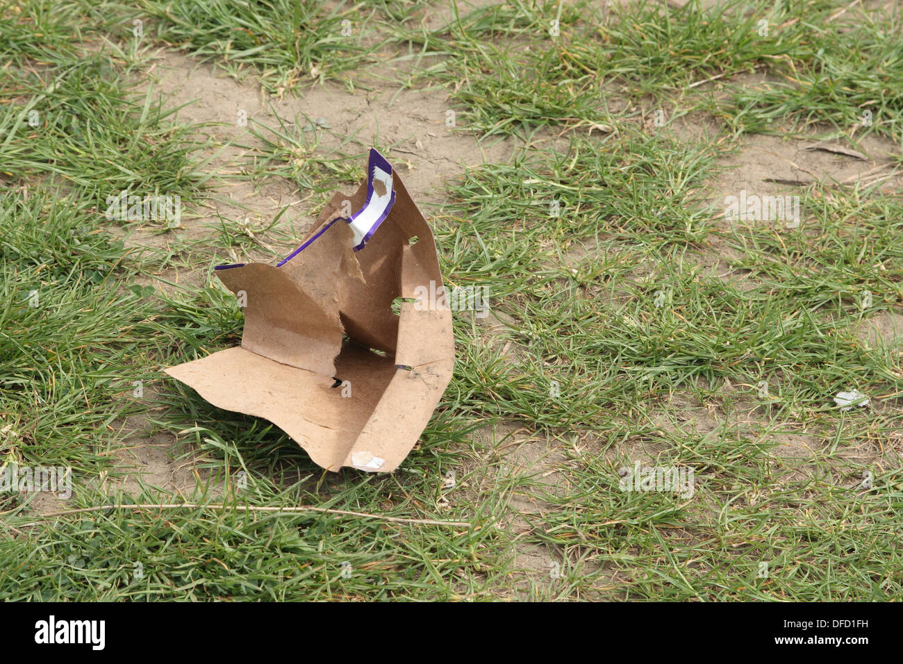 Litter on grass Stock Photo - Alamy