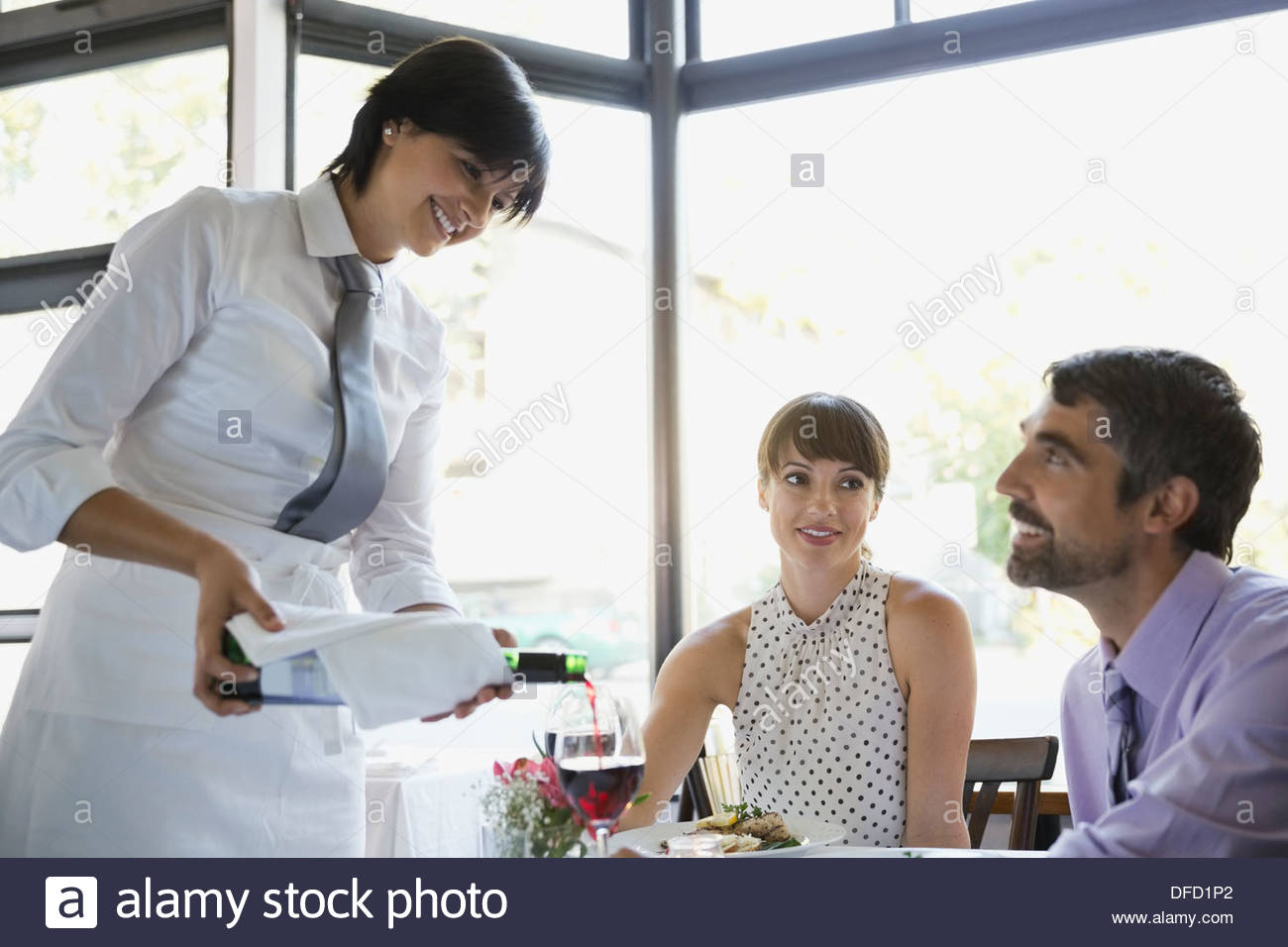 Waitress Serving Wine