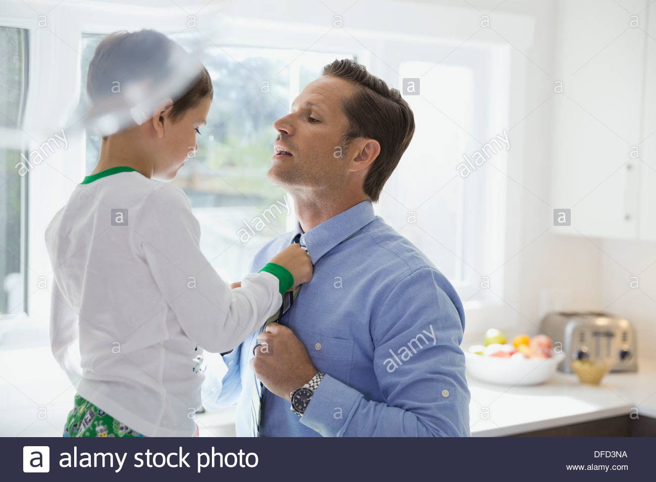 Straighten his tie hi-res stock photography and images - Alamy