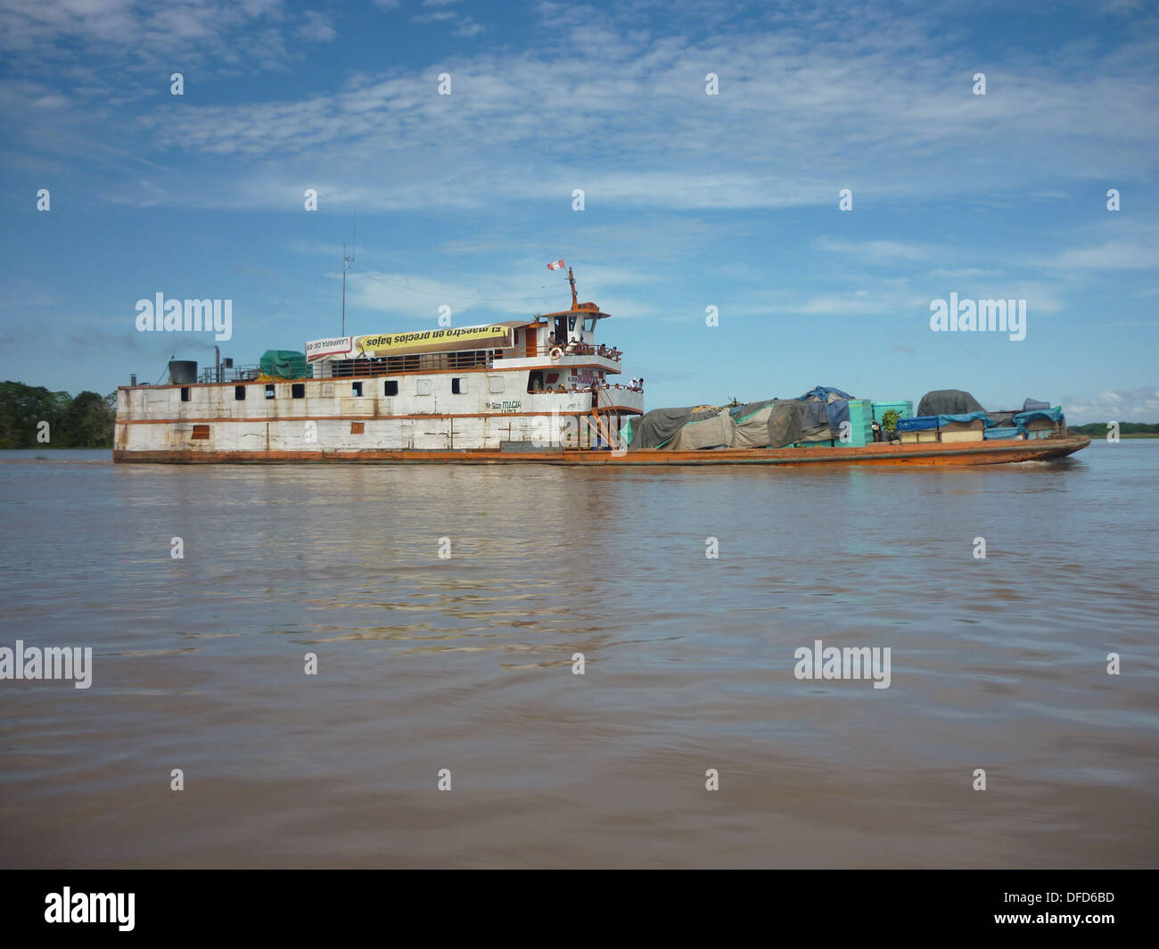 A Cargo/Passenger ship sails along the Amazon River near Iquitos, Peru ...