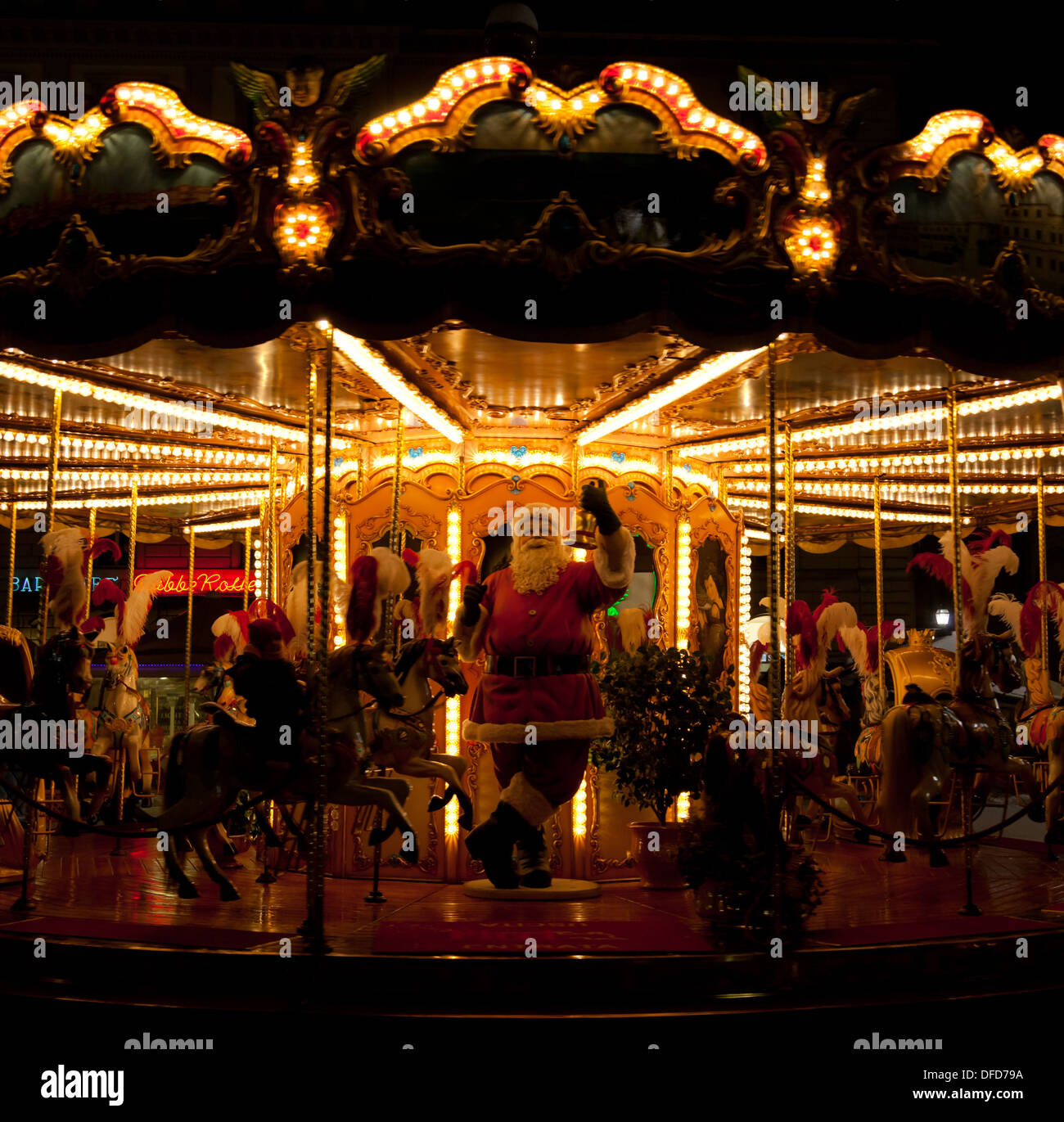Antique carousel for children with Christmas decorations and Santa ...