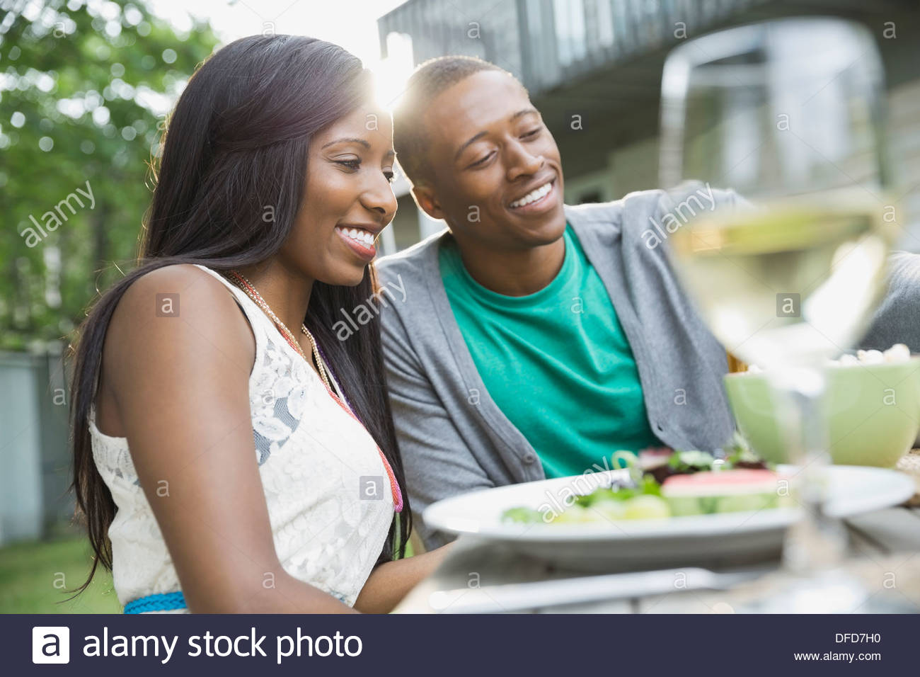 Couple sitting table hi-res stock photography and images - Alamy