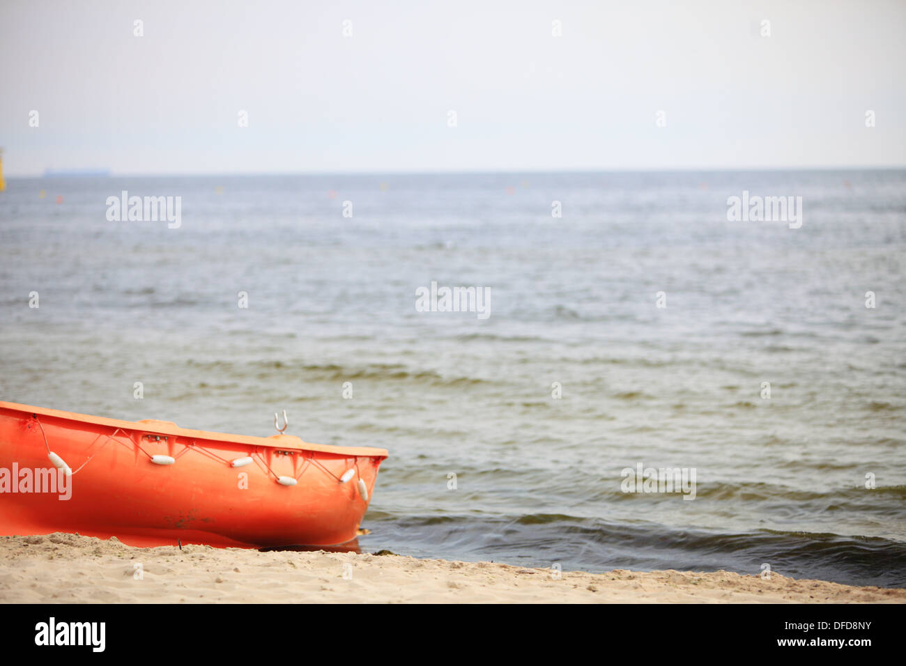 Beach life-saving. Lifeguard rescue equipment orange boat Stock Photo ...