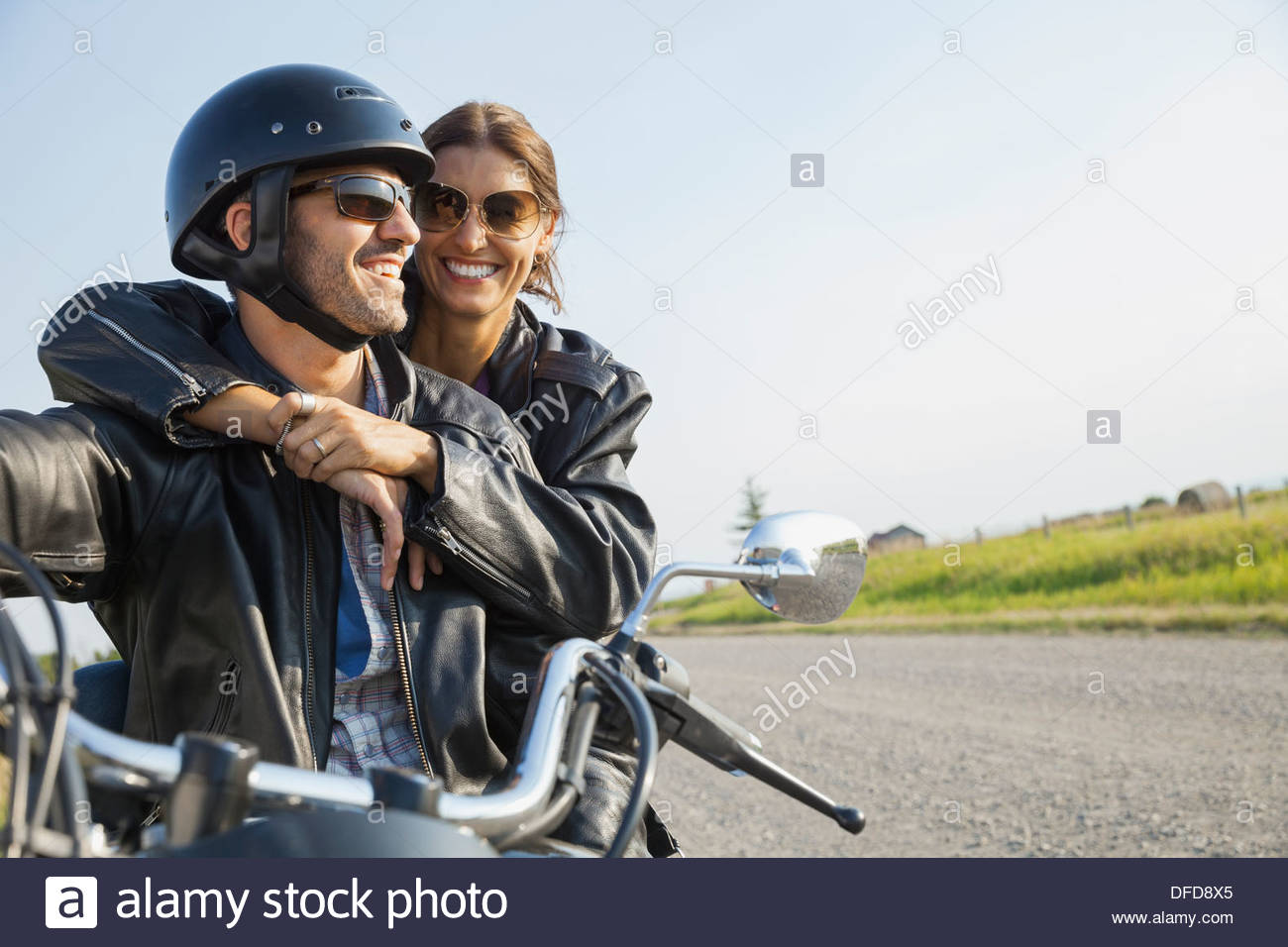 Couple on motorcycle with helmet hi-res stock photography and images ...