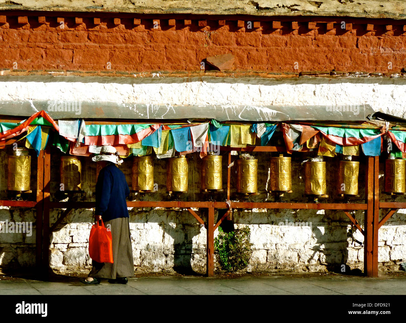 Monks with spinning wheel hi-res stock photography and images - Alamy