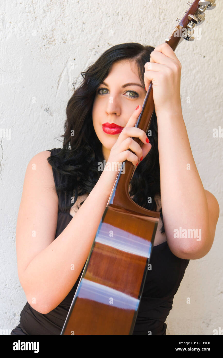 Guitar string woman hand outdoor hi-res stock photography and images ...