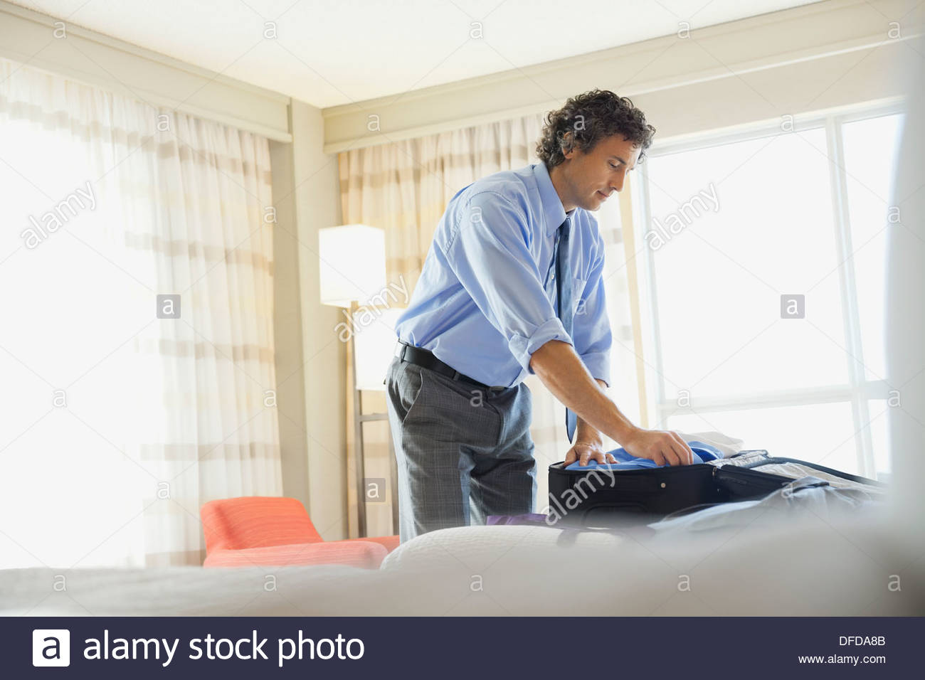 Professional packing suitcase hi-res stock photography and images - Alamy