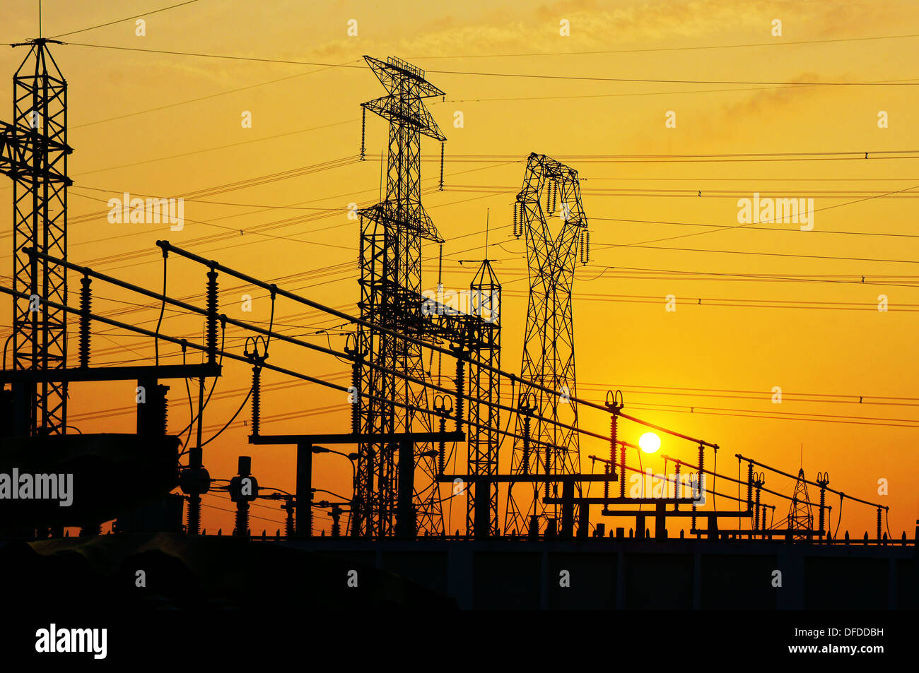 Electricity network at transformer station in sunrise, hdr Stock Photo ...