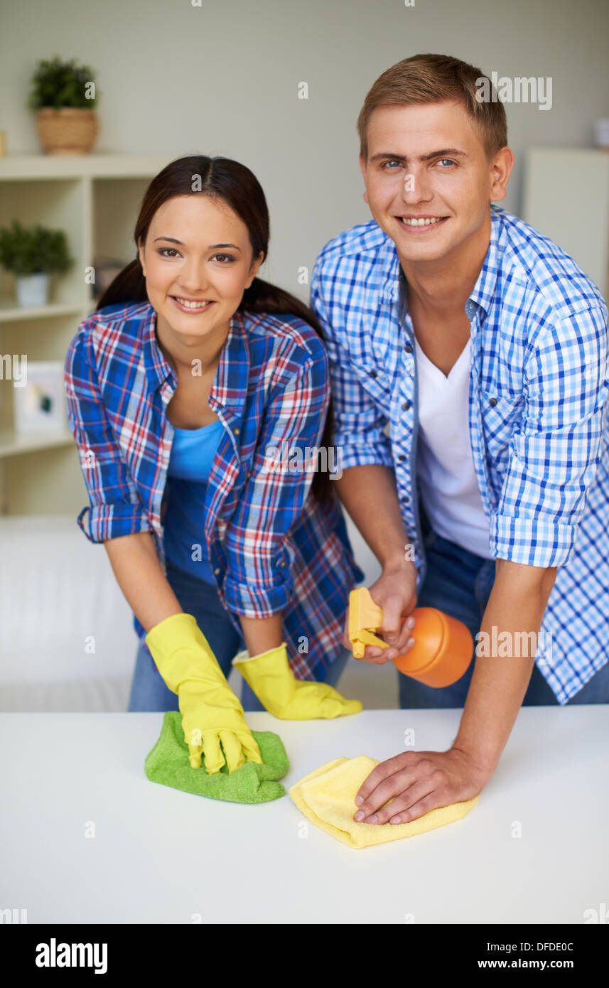 Couple cleaning table hi-res stock photography and images - Alamy
