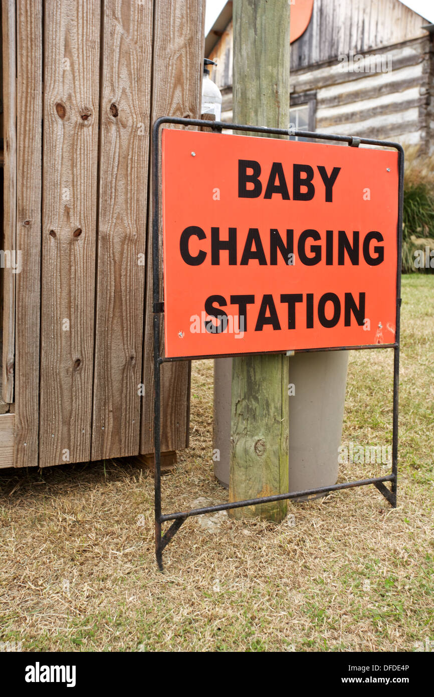 Baby changing station sign at a fair Stock Photo - Alamy