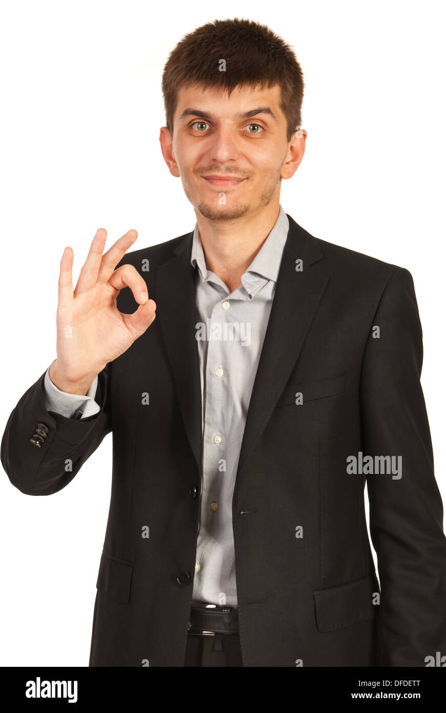Young business man showing okay sign hand gesture isolated on white ...