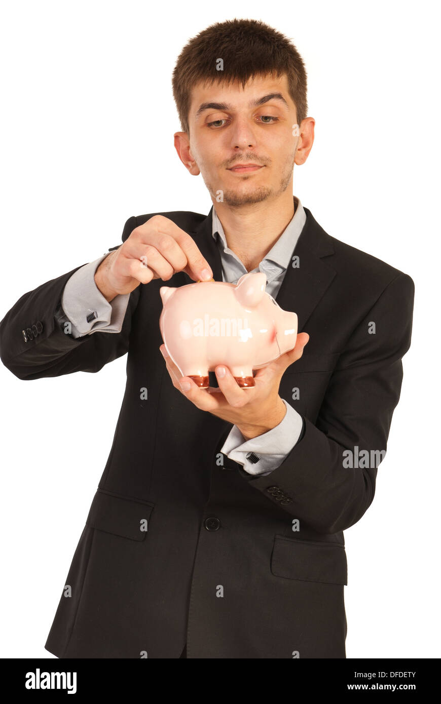 Young businessman saving money isolated on white background Stock Photo ...