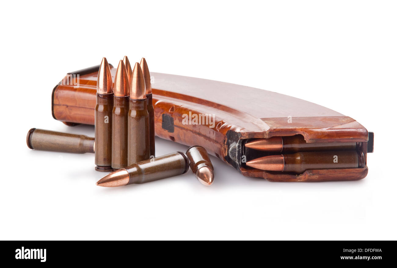 scratched ammunition for AK-47 on a white background Stock Photo - Alamy