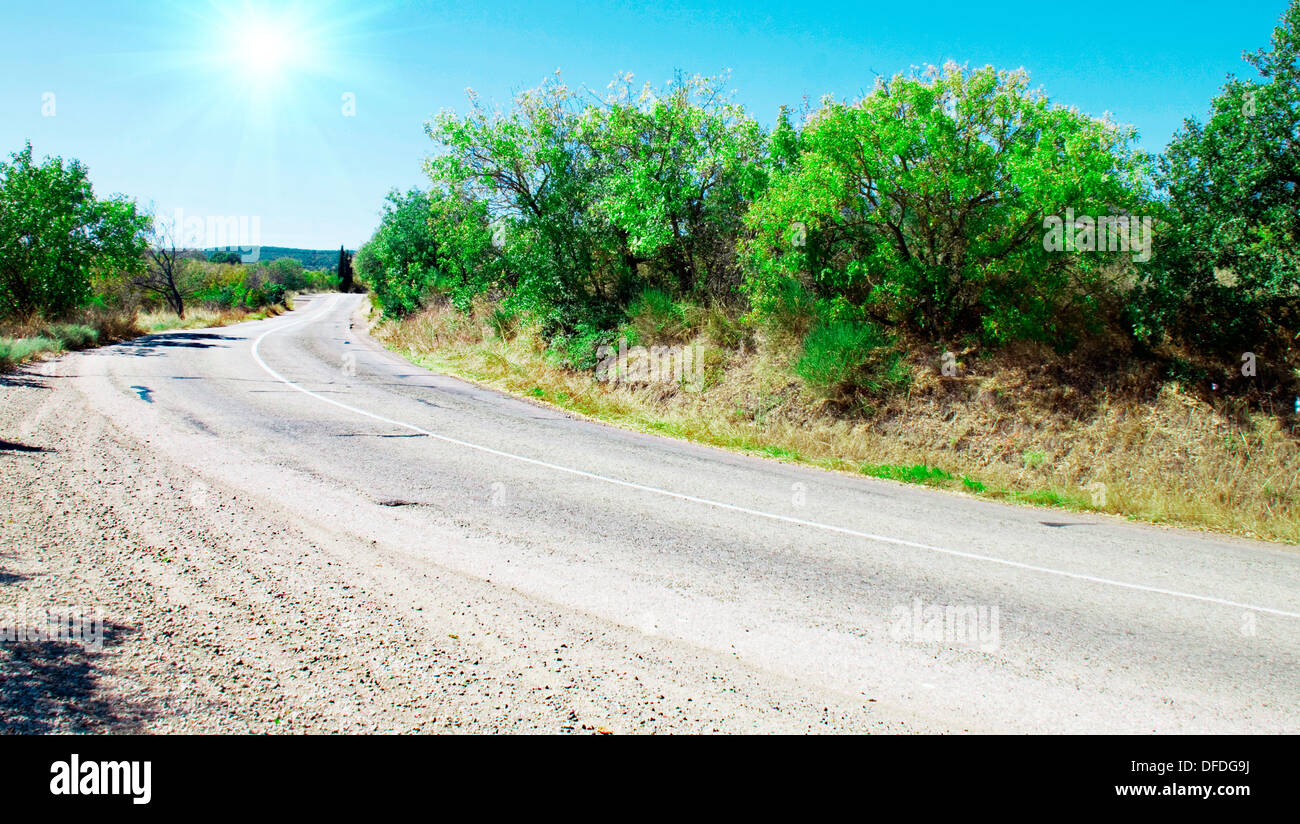 Picture of empty countryside road Stock Photo - Alamy