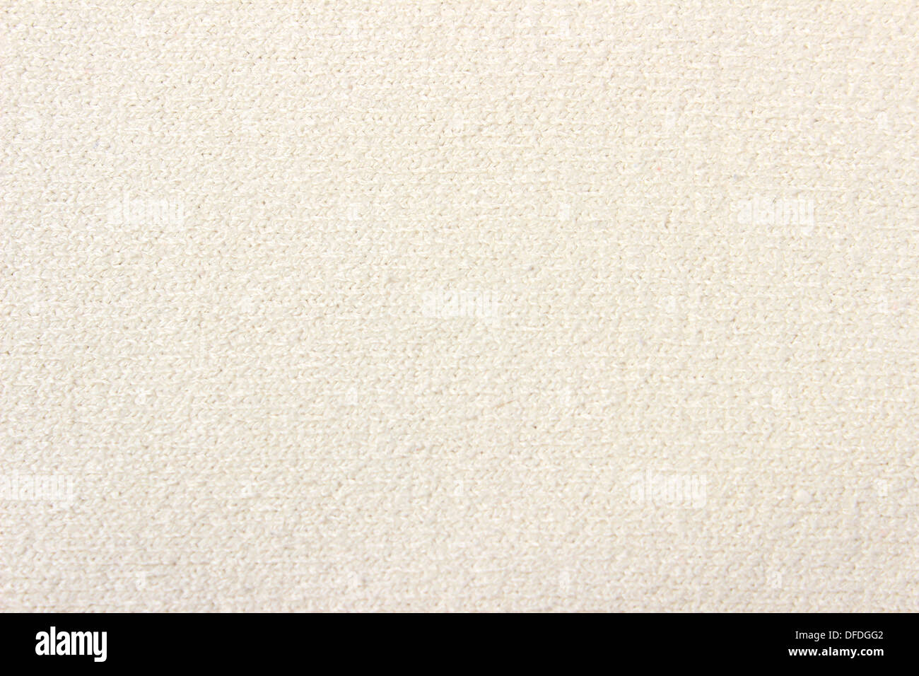 Close-up of knitted wool texture sand color. Крупным планом трикотажная ...
