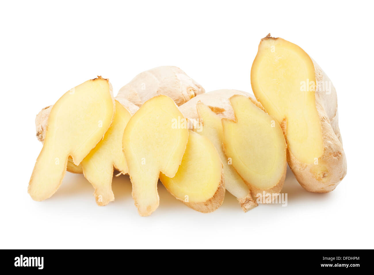 Ginger cut in slices on a white background Stock Photo - Alamy