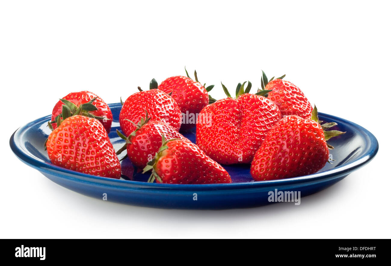 Plate red strawberries isolated Cut Out Stock Images & Pictures - Alamy